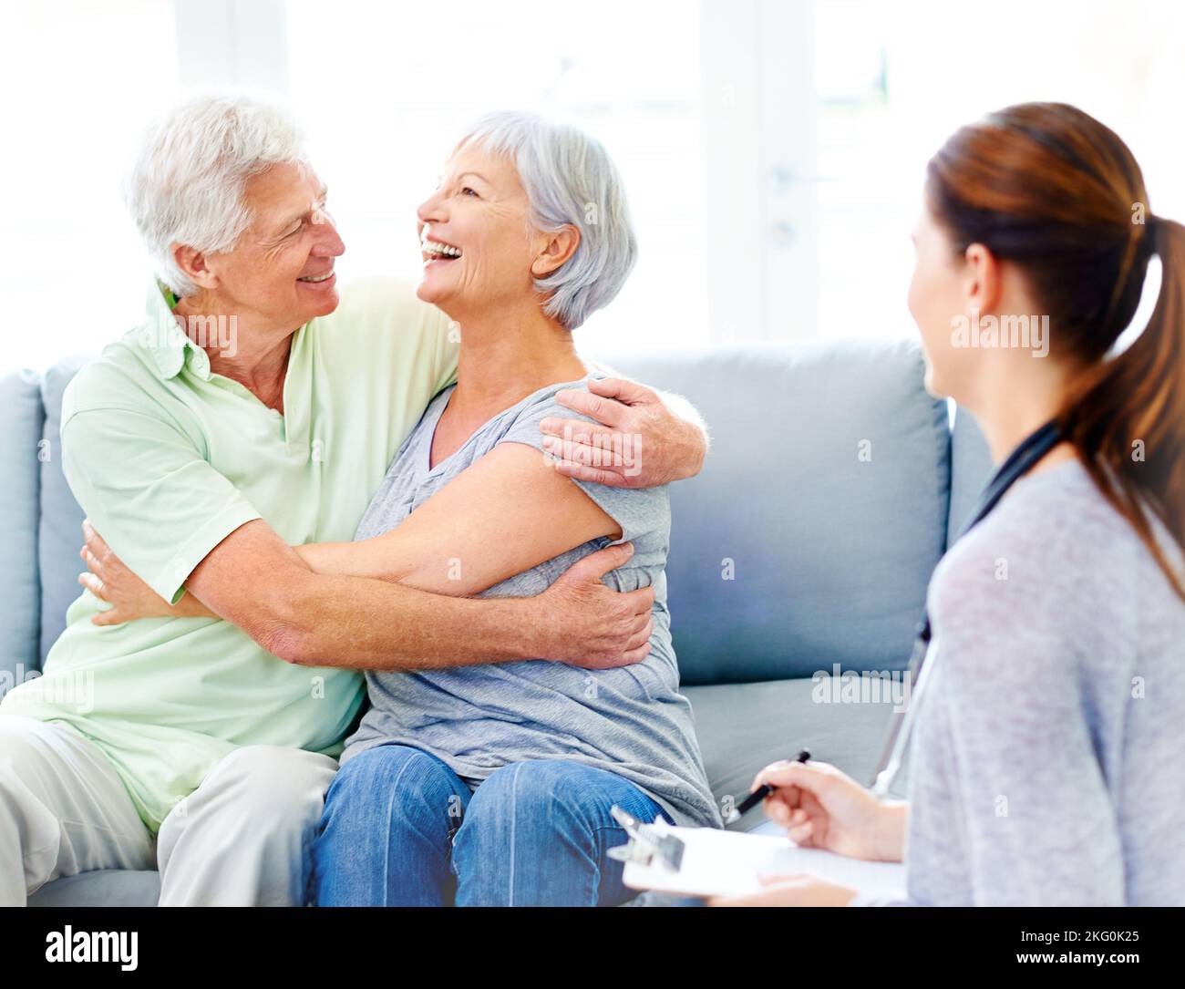 At last I can relax. A doctor explaining positive test results to an ...
