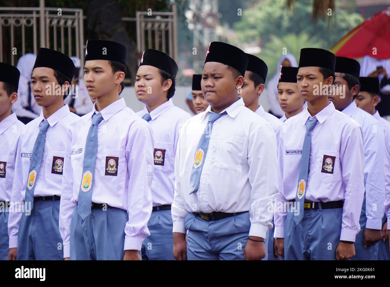 Indonesian senior high school students with uniforms, marching to ...