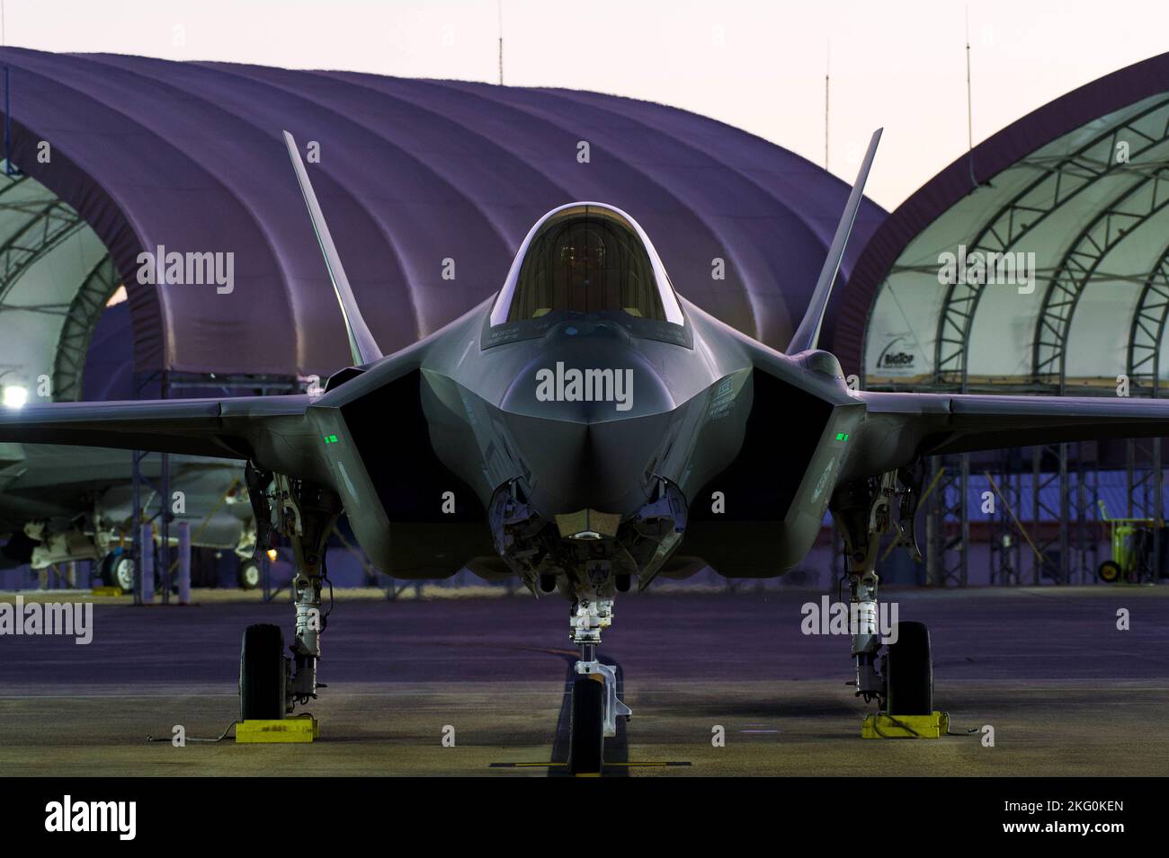 A U.S. Air Force pilot prepares to take off for a night-flying mission ...