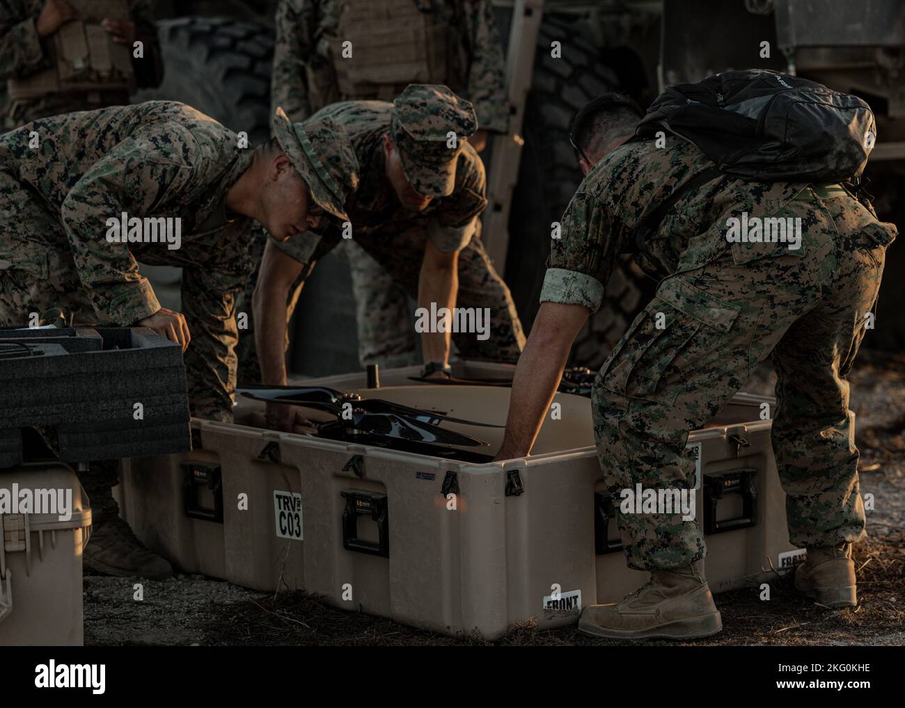 U.S. Marine Corps Lance Cpl. Phillip Banuelos, left, a motor transport operator with 1st ...