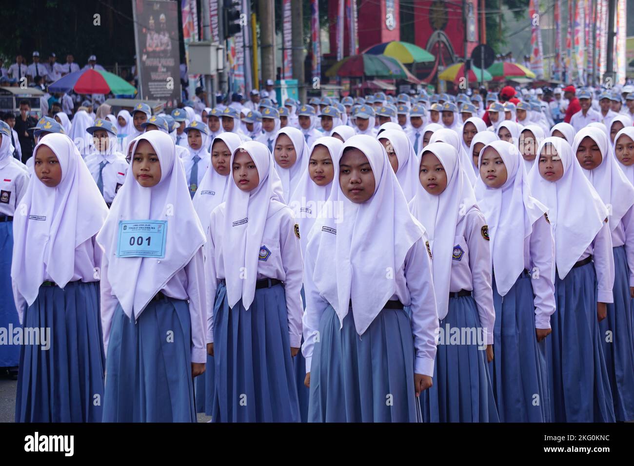 Indonesian senior high school students with uniforms, marching to ...