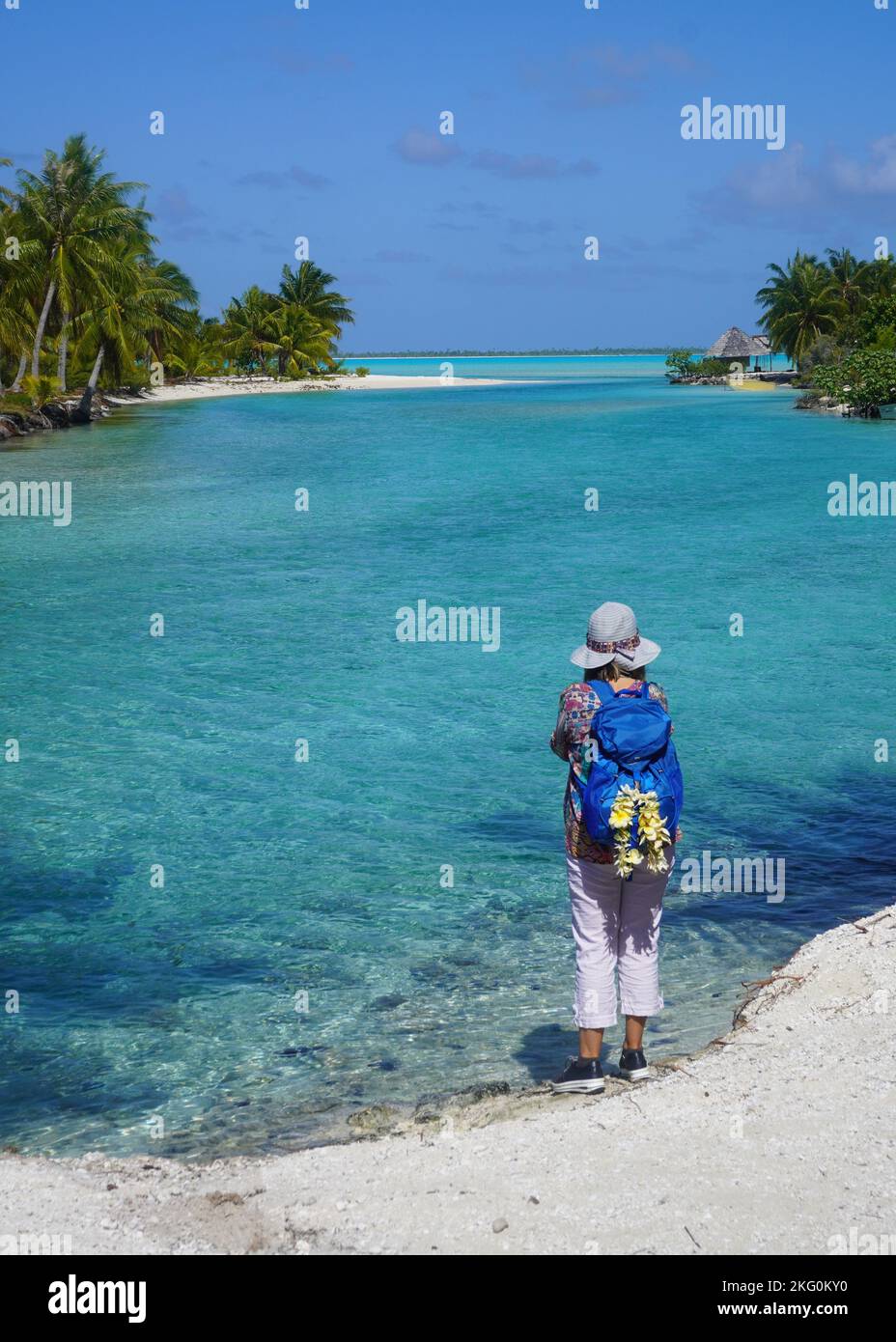 Female Tourist photographing a Polynesian Ocean Dreamscape on Anaa ...
