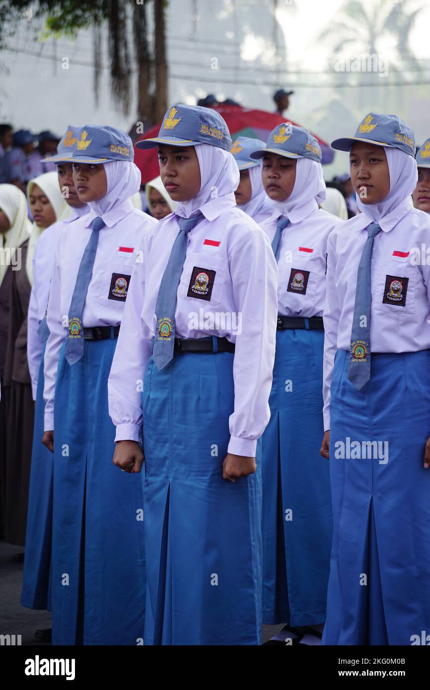 Indonesian senior high school students with uniforms, marching to ...