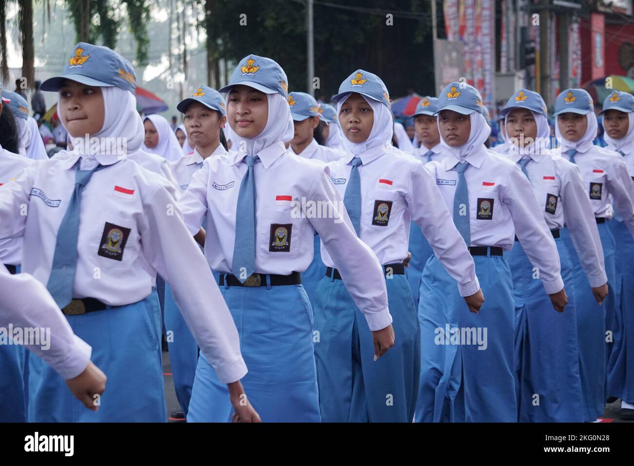 Indonesian senior high school students with uniforms, marching to ...