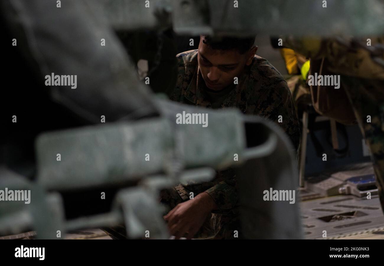 U.S. Marine Lance Cpl. Luis Nunez, an embarkation specialist with the ...