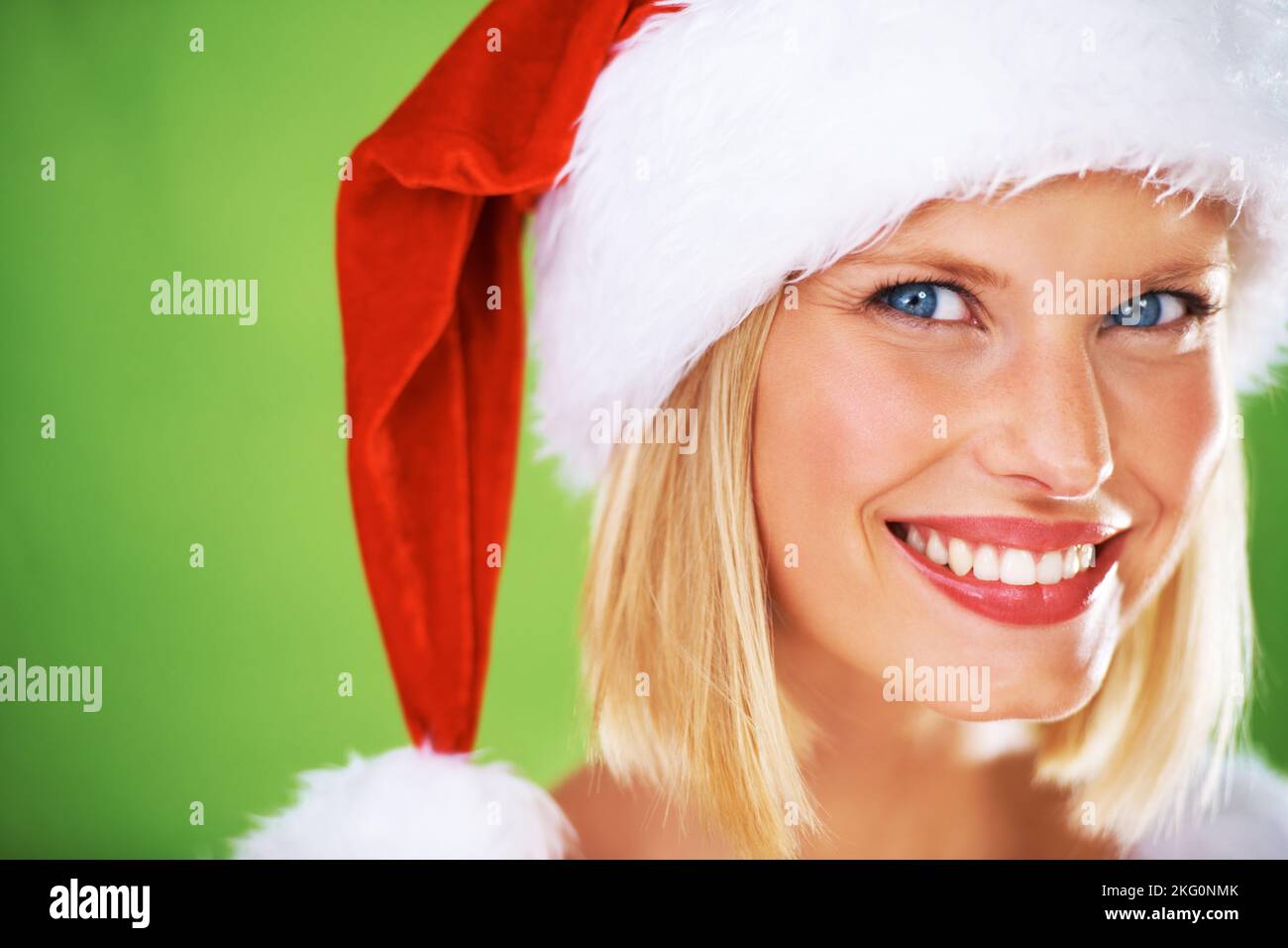 Woman, face or christmas hat on green screen in holiday celebration ...