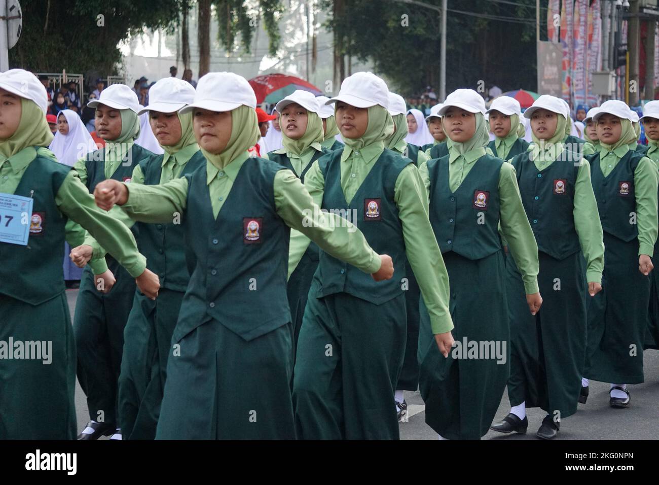 Indonesian senior high school students with uniforms, marching to ...