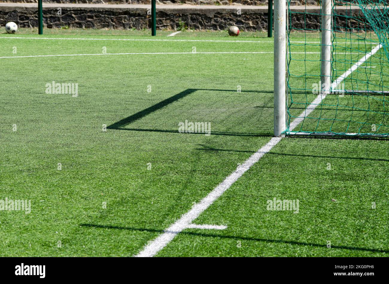 A view of end line and goal of an artificial grass football pitch Stock ...