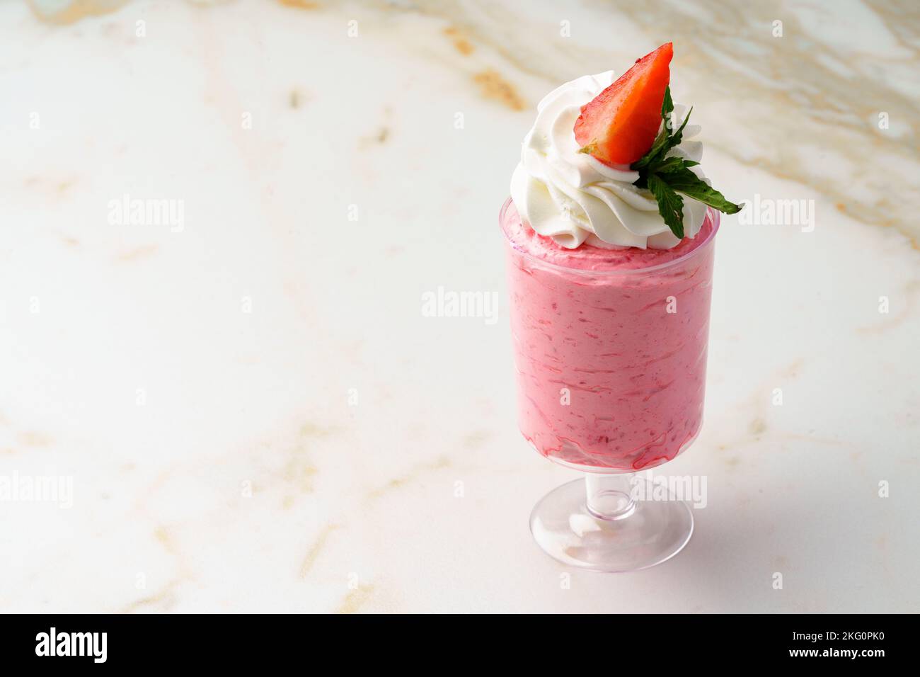 Mousse dessert with cream in glass on the table Stock Photo - Alamy