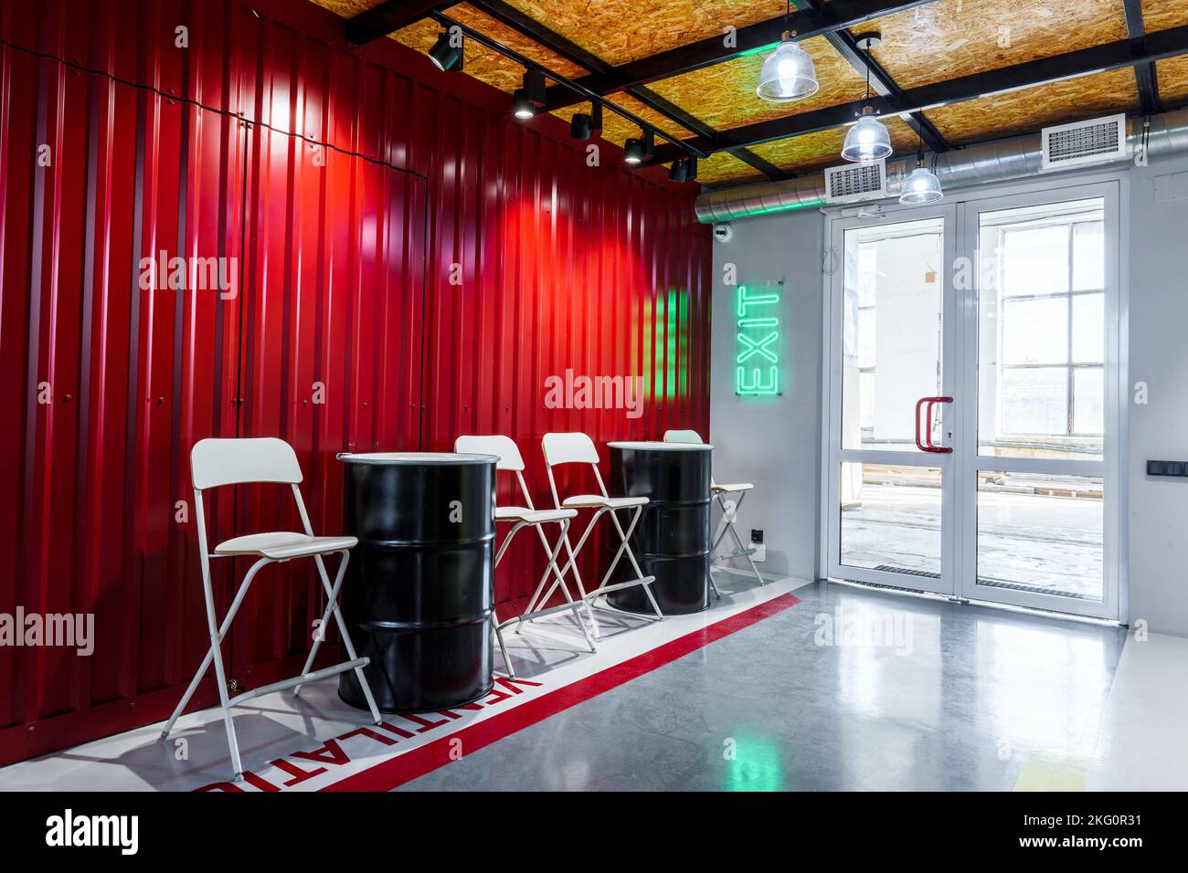 Public area room interior with table and bar stools Stock Photo - Alamy