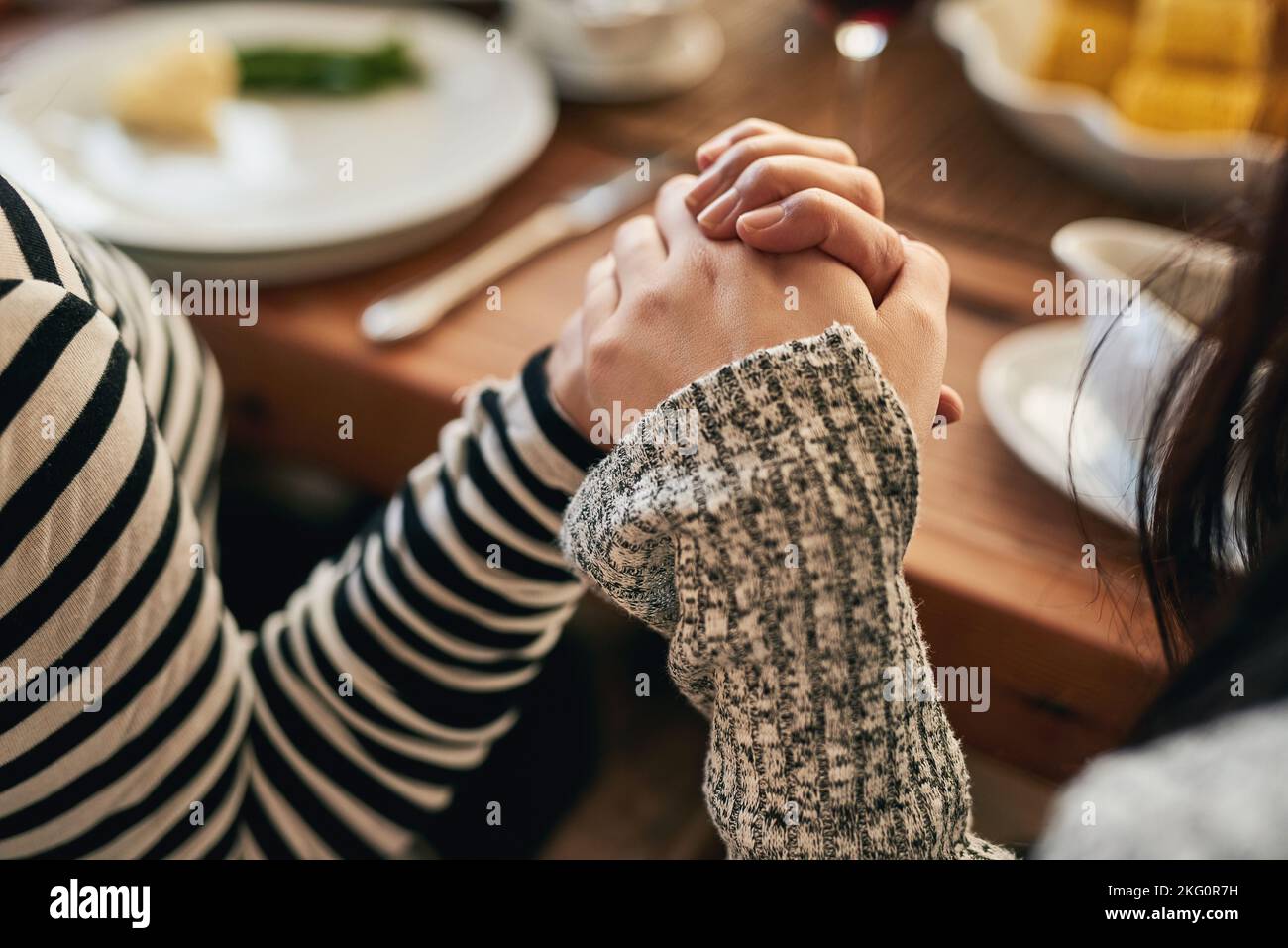 Family praying together meal dining hi-res stock photography and images ...