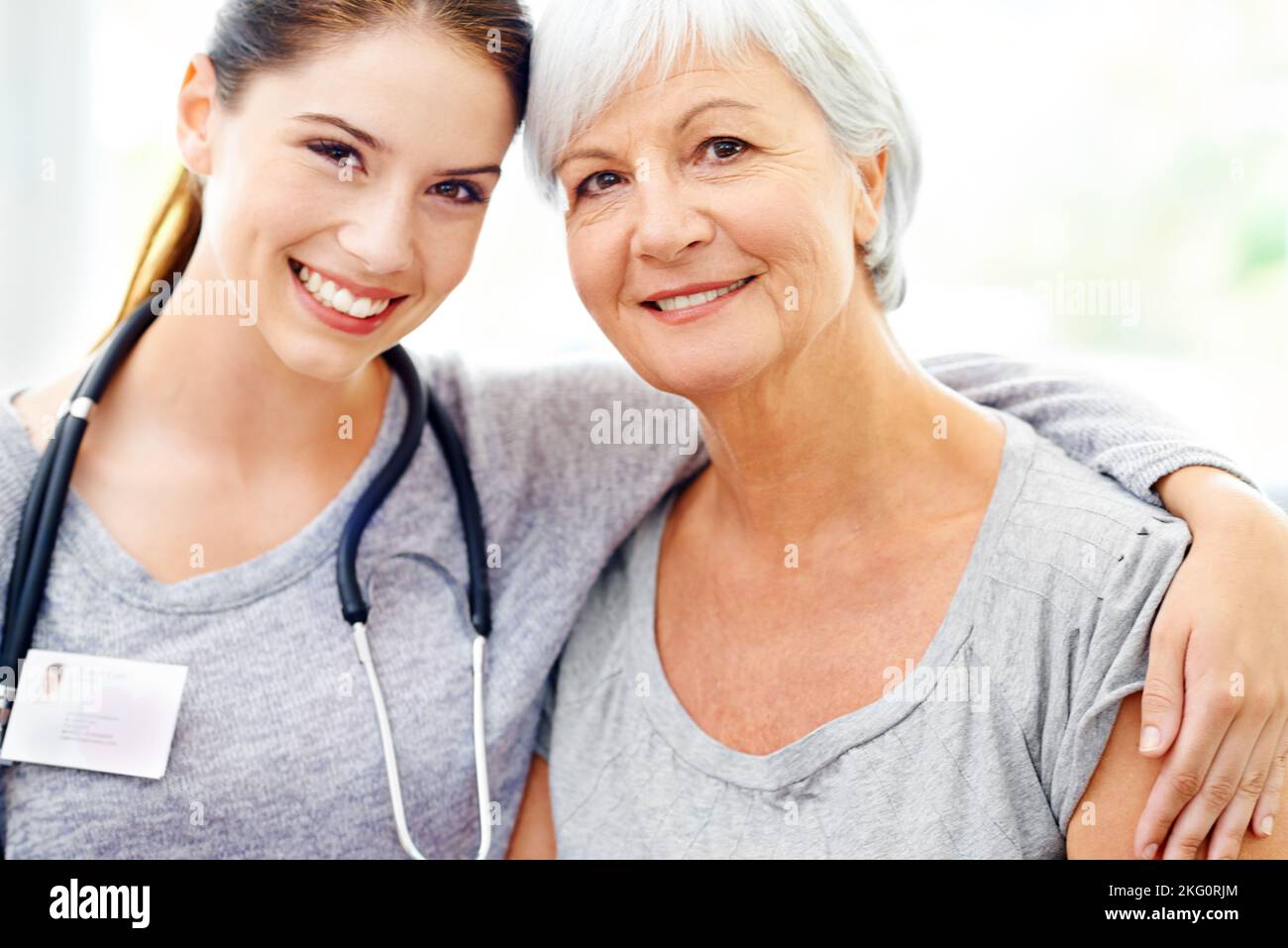 Every patient is special. A caring healthcare practitioner with her arm ...