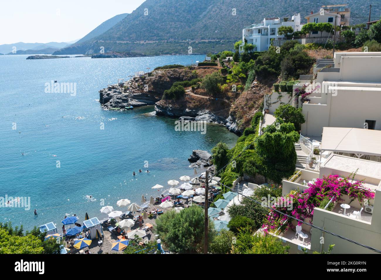 An aerial view of people having fun at a tropical beach - a beautiful ...