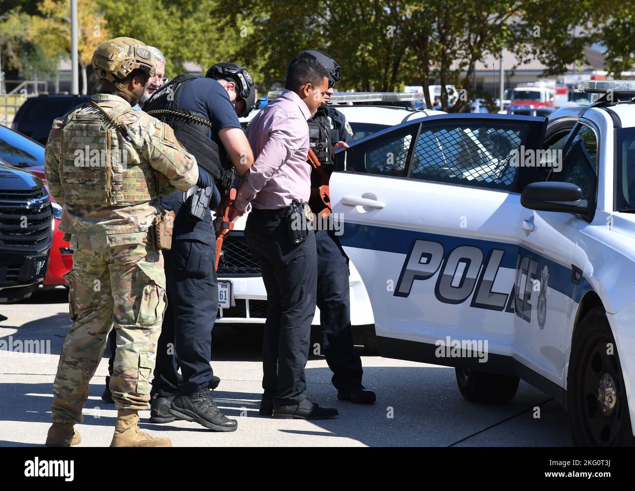 Members of the 81st Security Forces Squadron prepare to place Detective ...