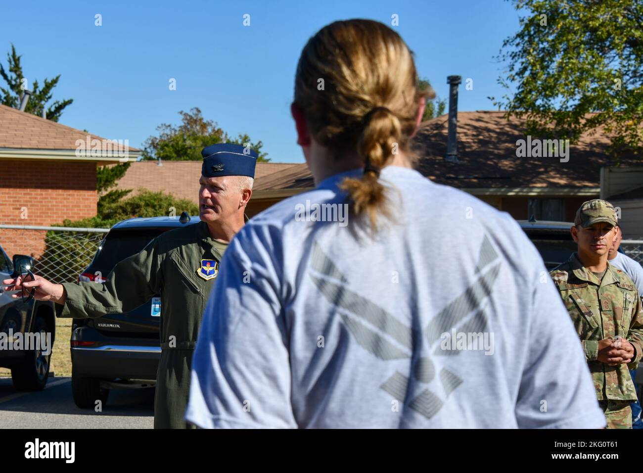 U.S. Air Force Col. Blaine Baker, 97th Air Mobility Wing commander, gives a speech to Airmen ...