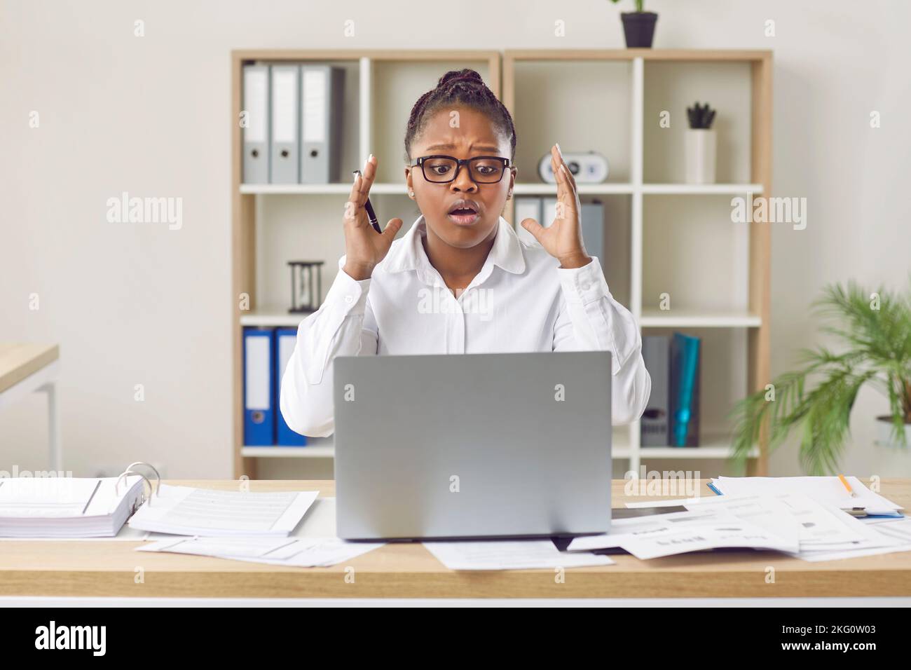 Female Office Worker Having Problem Due To Error On Her Laptop Computer