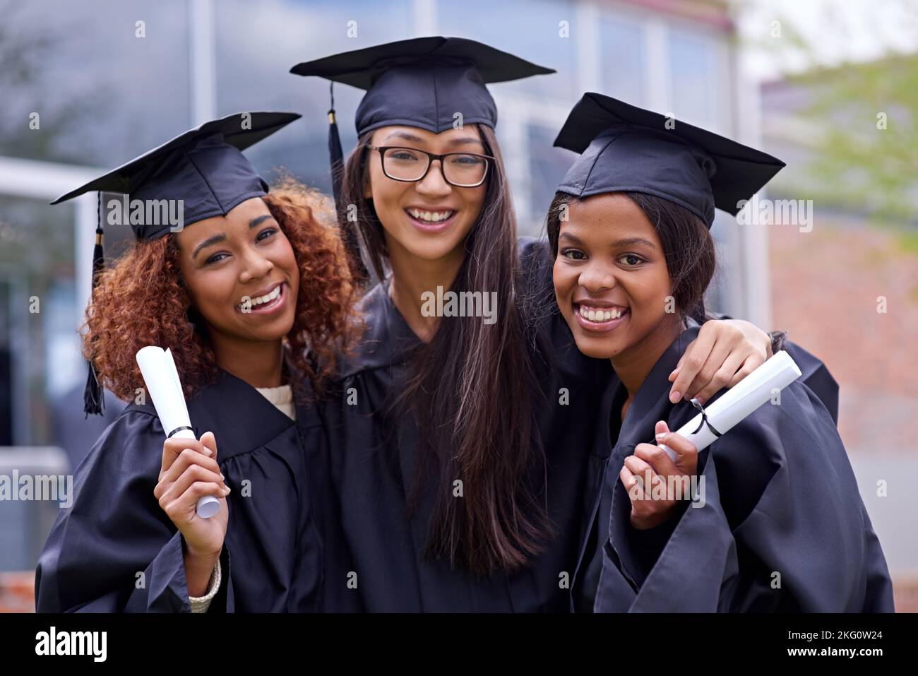 College is our means to success. three female friends graduating from ...