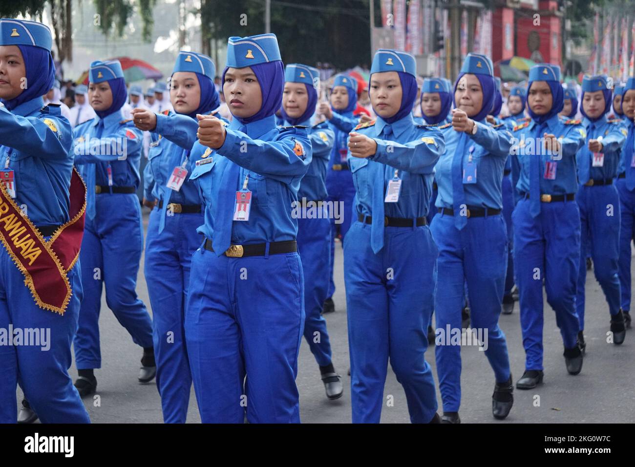 Indonesian senior high school students with uniforms, marching to ...