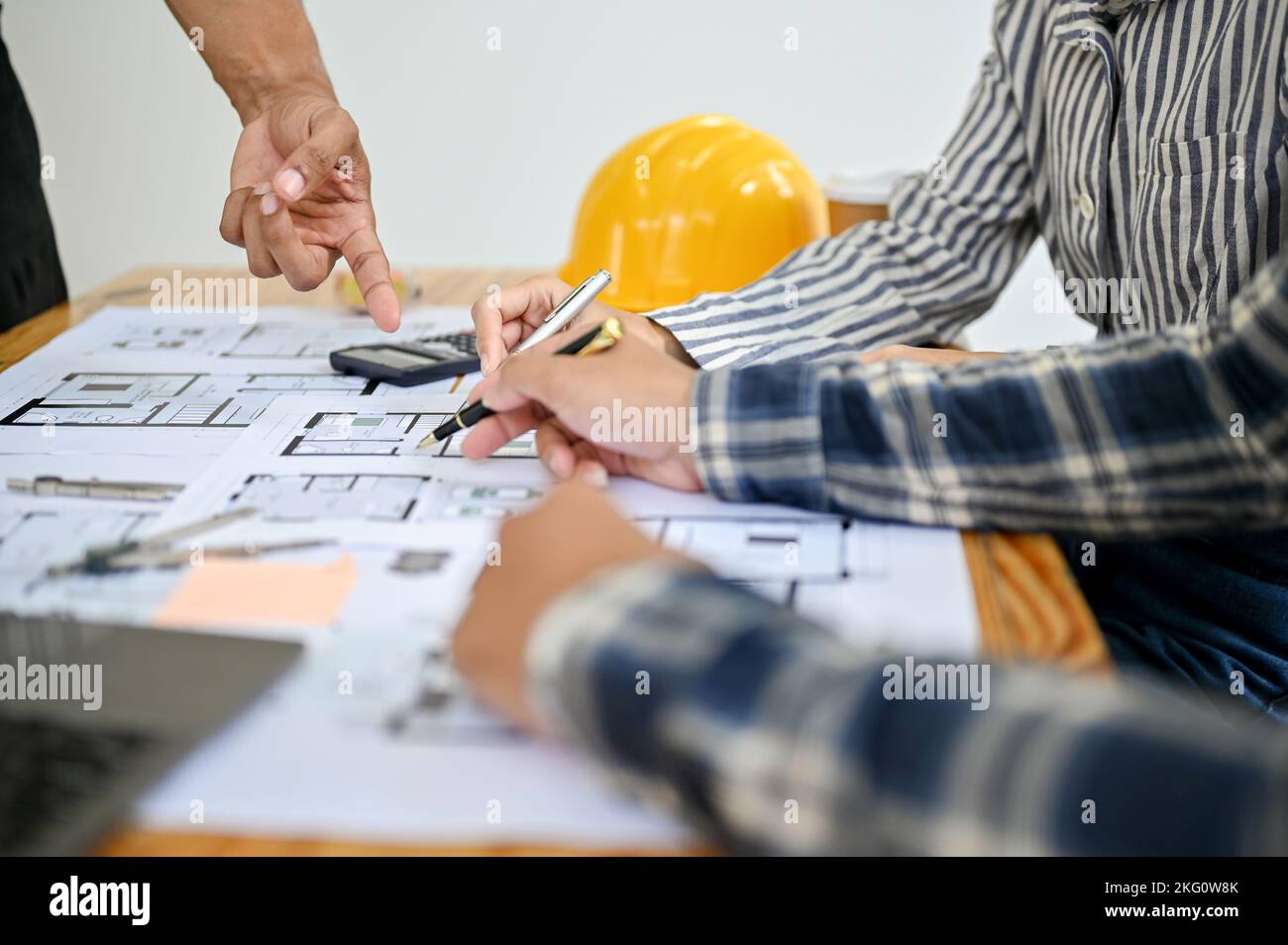 A team of professional Asian architect and engineer are working ...