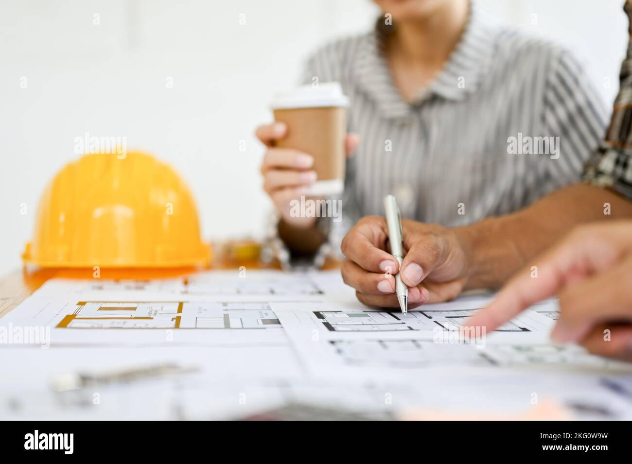 Team of construction engineer and construction inspector working ...