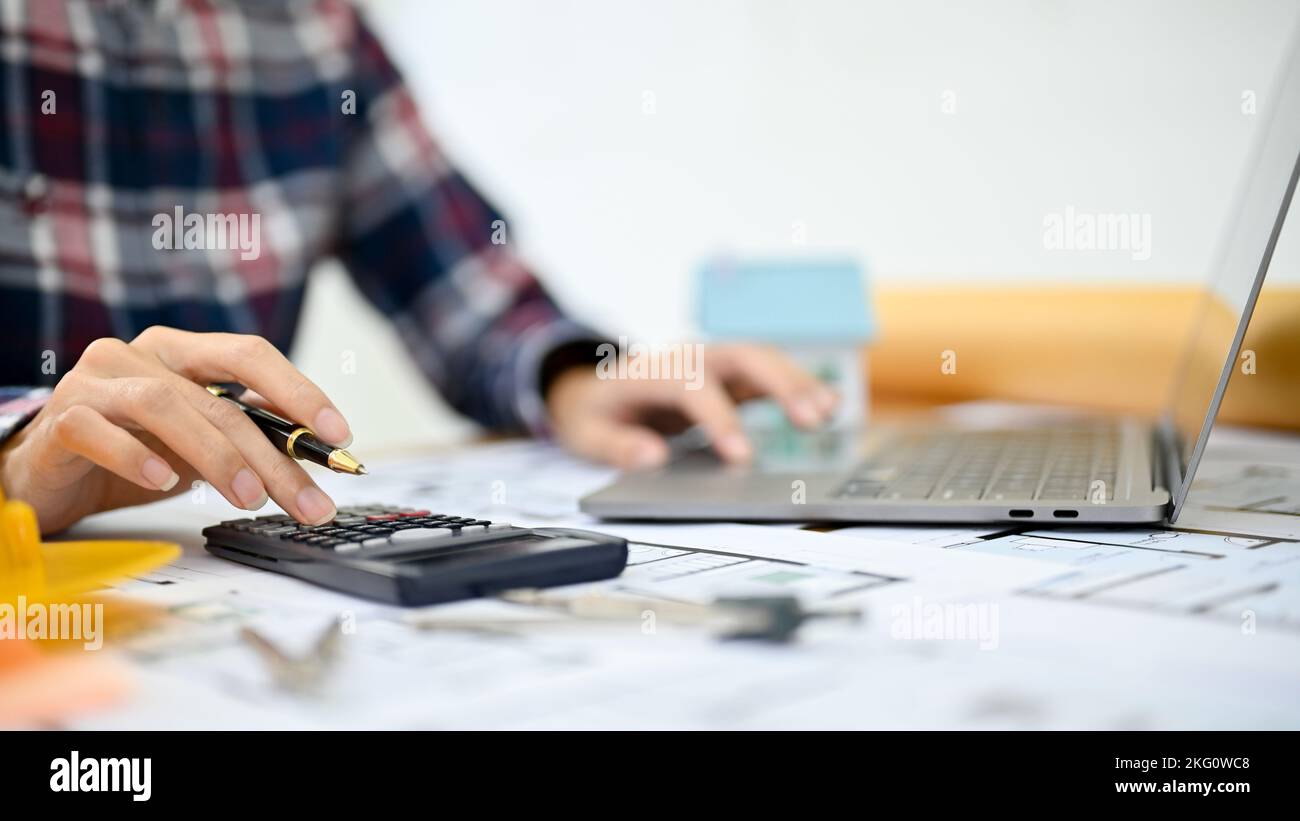 close-up image, Professional Asian female architect or engineer using ...