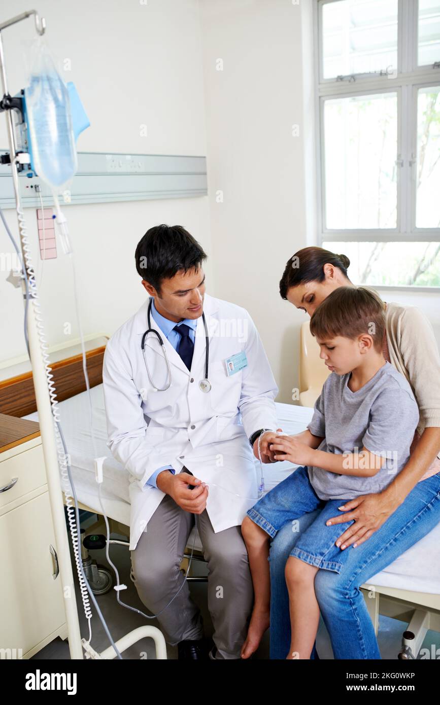 I promise you wont have to wear it forever. a doctor checking to see ...