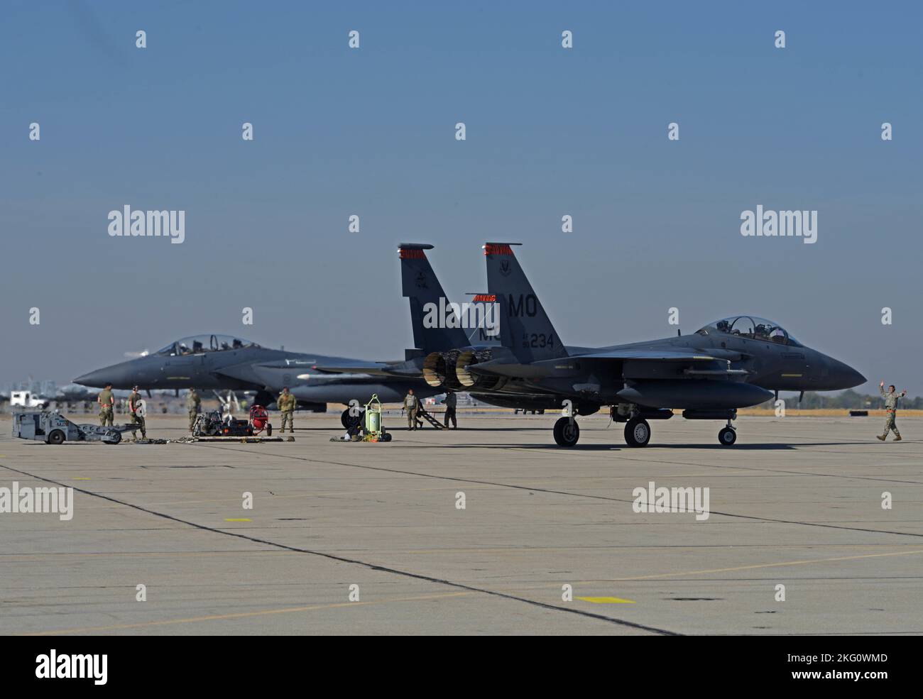 U.S. Airmen with the 366th Munitions Squadron prepare to load munitions ...