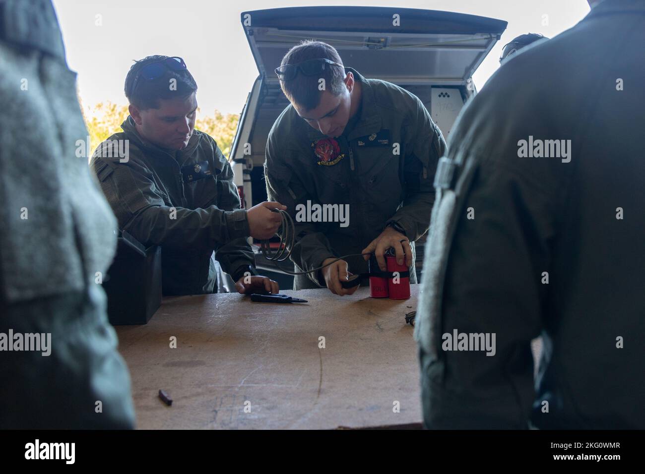 U.S. Marine Corps Staff Sgt. Destri Stemme, right, explosive ordnance ...