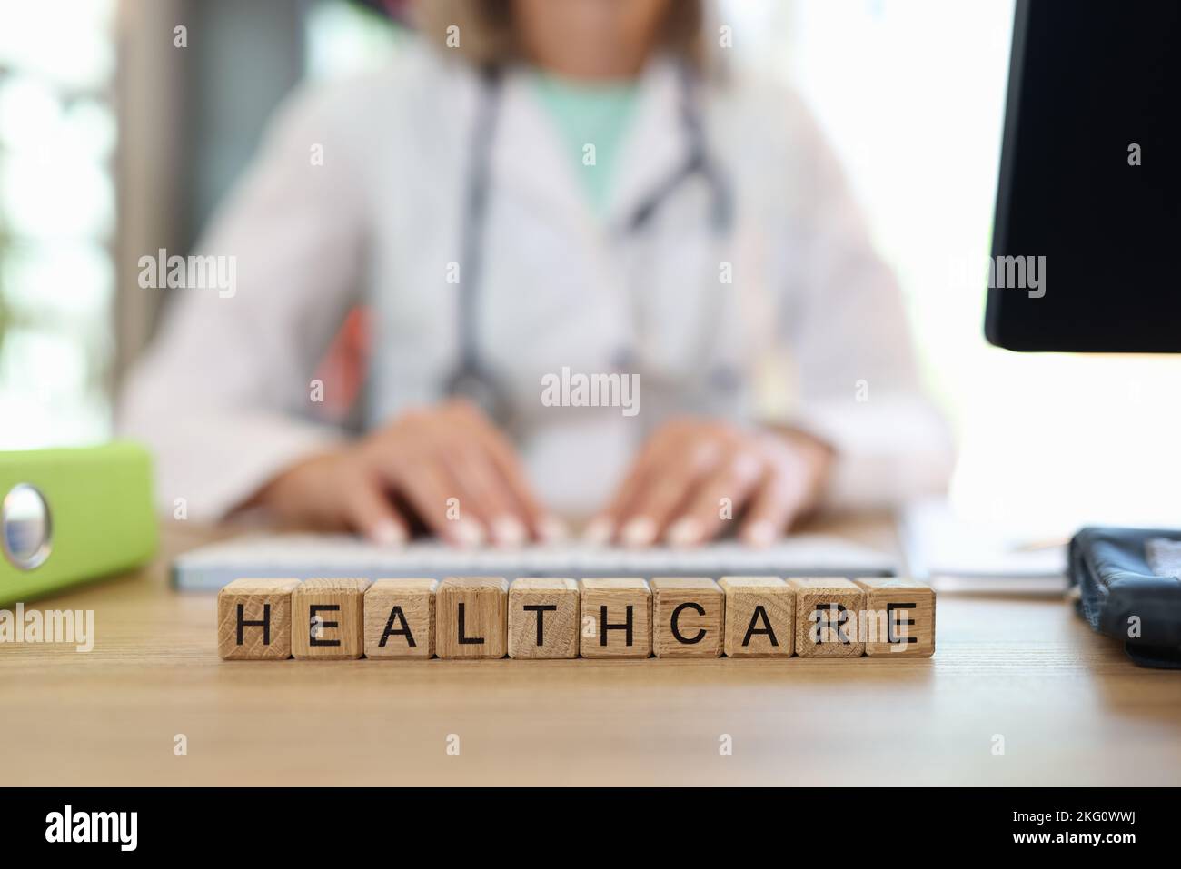 Healthcare word collected with wooden cubes in row Stock Photo - Alamy
