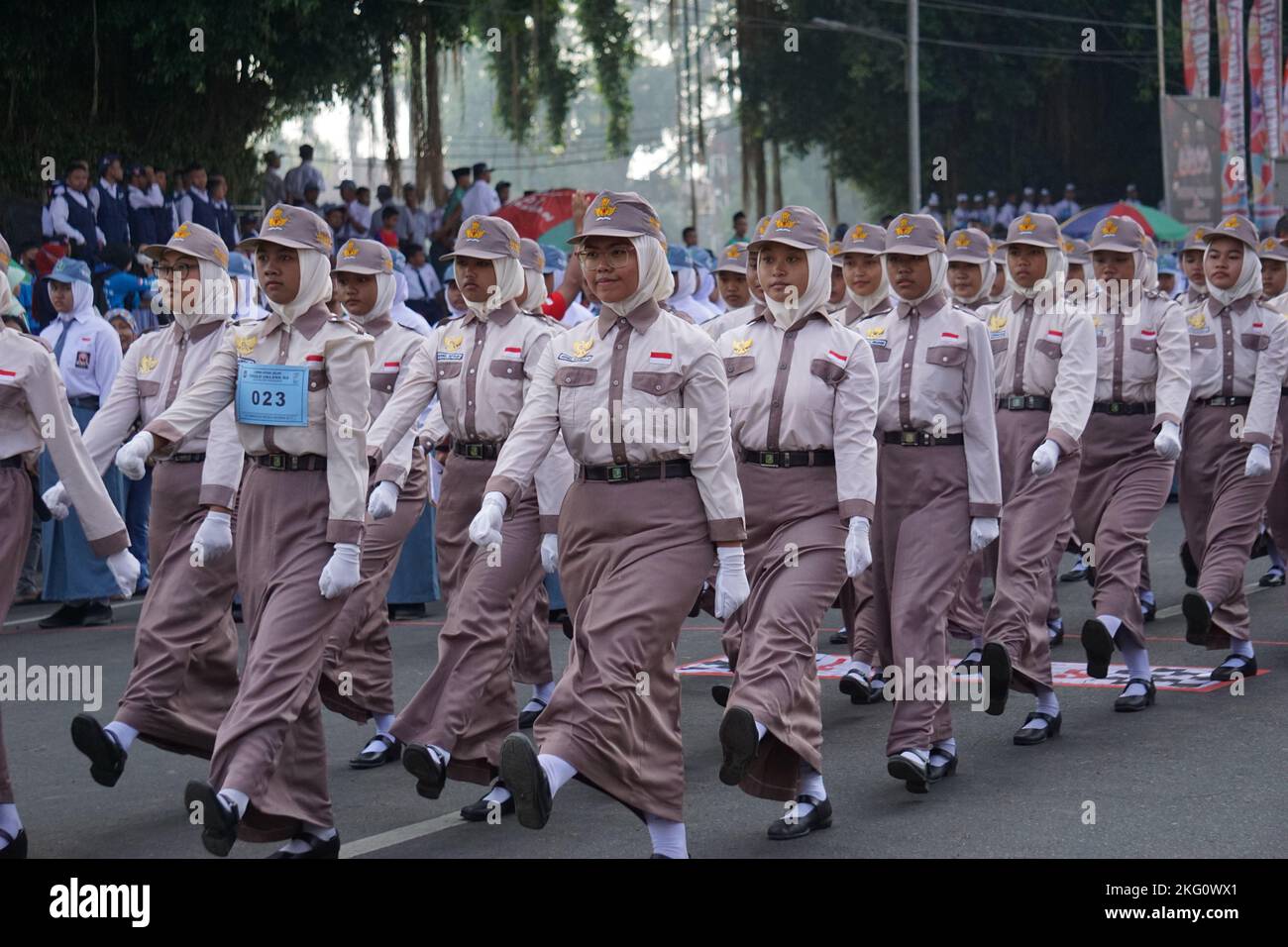 Indonesian senior high school students with uniforms, marching to ...