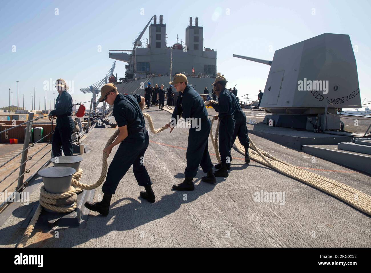 221021-N-EH998-1001 DUQM, Oman (Oct. 21, 2022) Sailors handle line ...