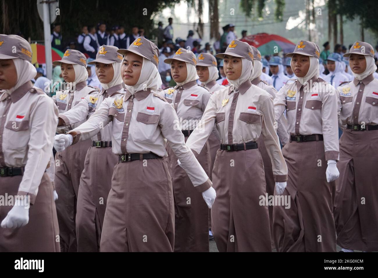 Indonesian senior high school students with uniforms, marching to ...