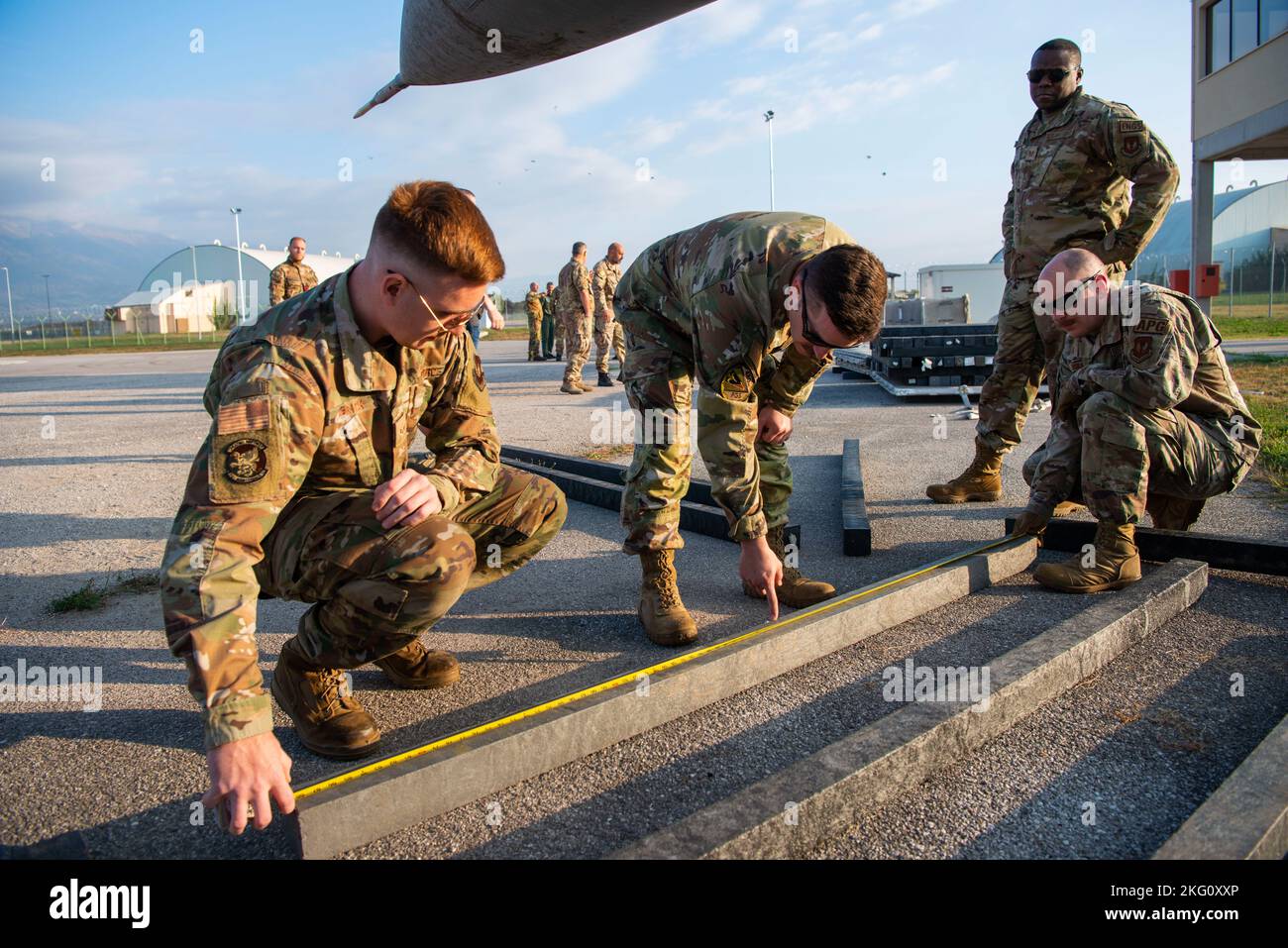 U.S. Airmen set up dunnage for a bag lift during a crashed, damaged or ...