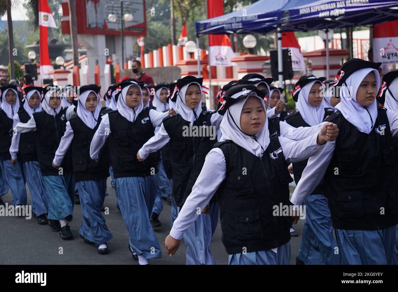 Indonesian senior high school students with uniforms, marching to ...