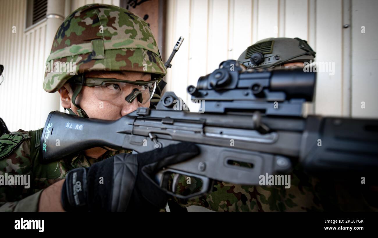 Japanese Ground Self-Defense Force (JGSDF) soldiers conduct close ...