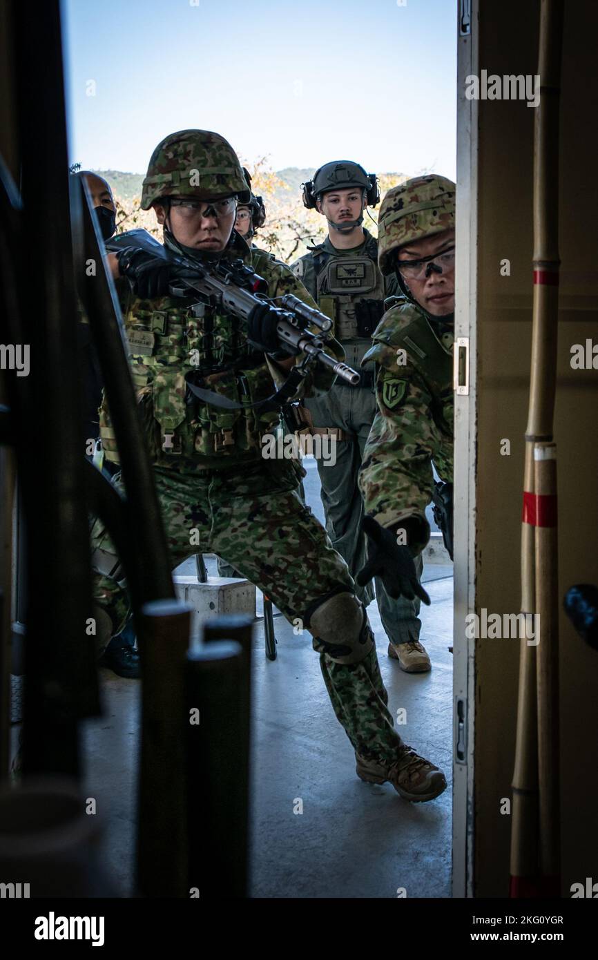 Japanese Ground Self-Defense Force (JGSDF) soldiers conduct close ...