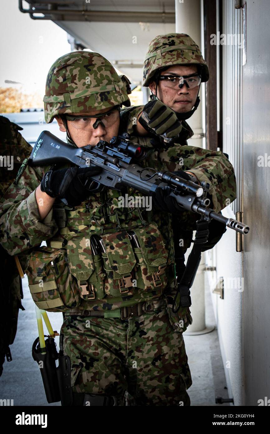 Japanese Ground Self-Defense Force (JGSDF) soldiers conduct close ...