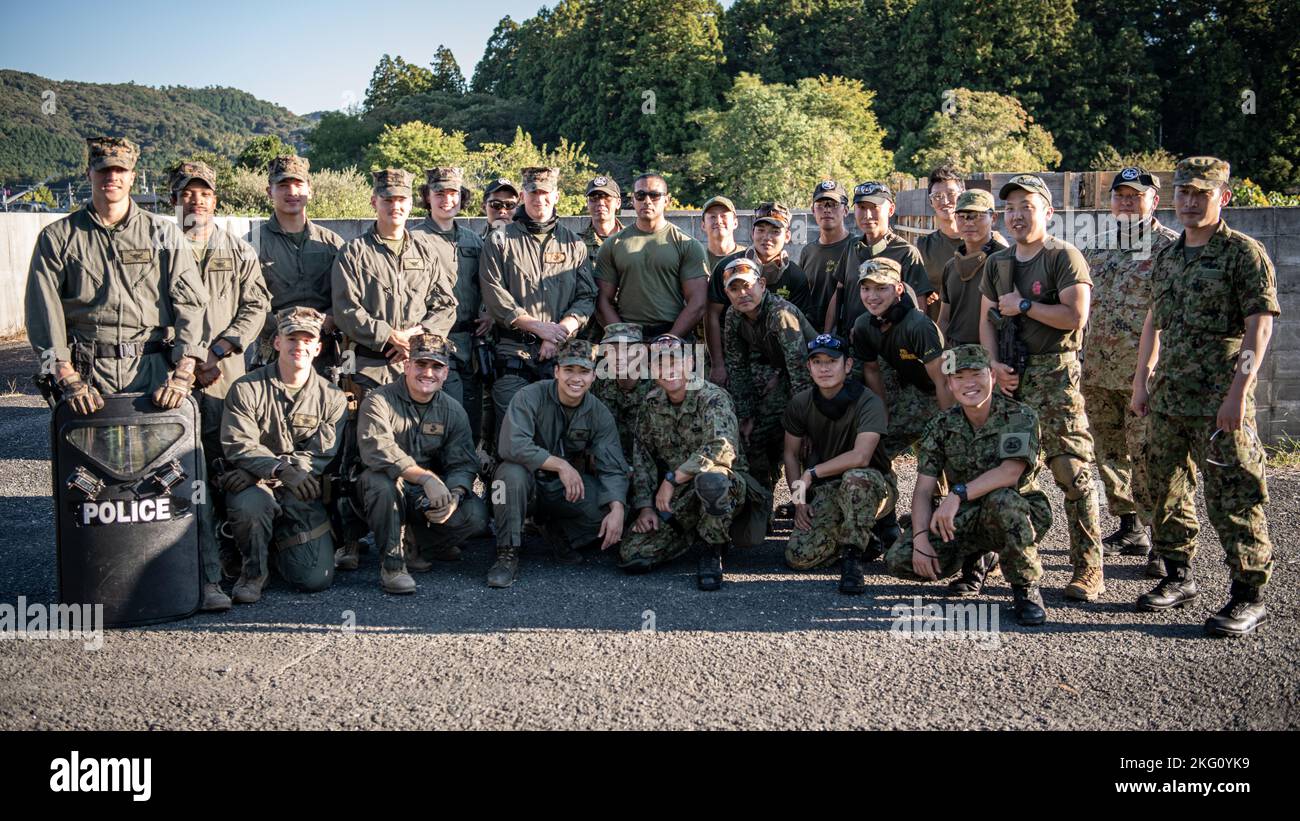 U.S. Marines with the Marine Corps Air Station (MCAS) Iwakuni Provost ...