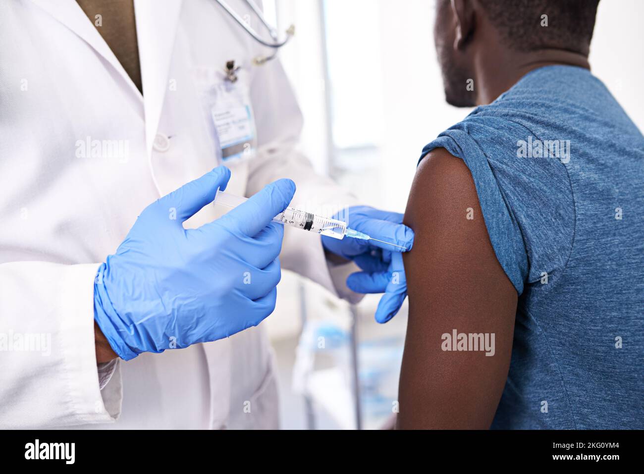 Its a tiny ouch with huge benefits. Closeup shot of a male patient ...