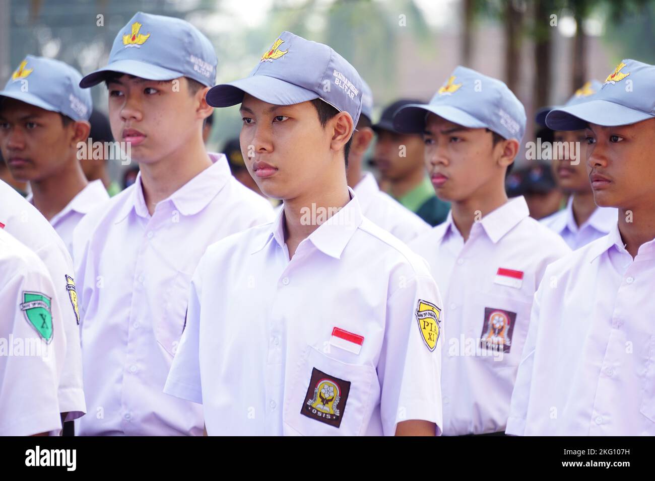 Indonesian senior high school students with uniforms, marching to ...