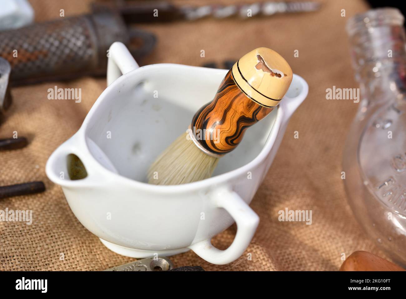 Old Victorian shaving brush and bowl on display at a market Stock Photo ...