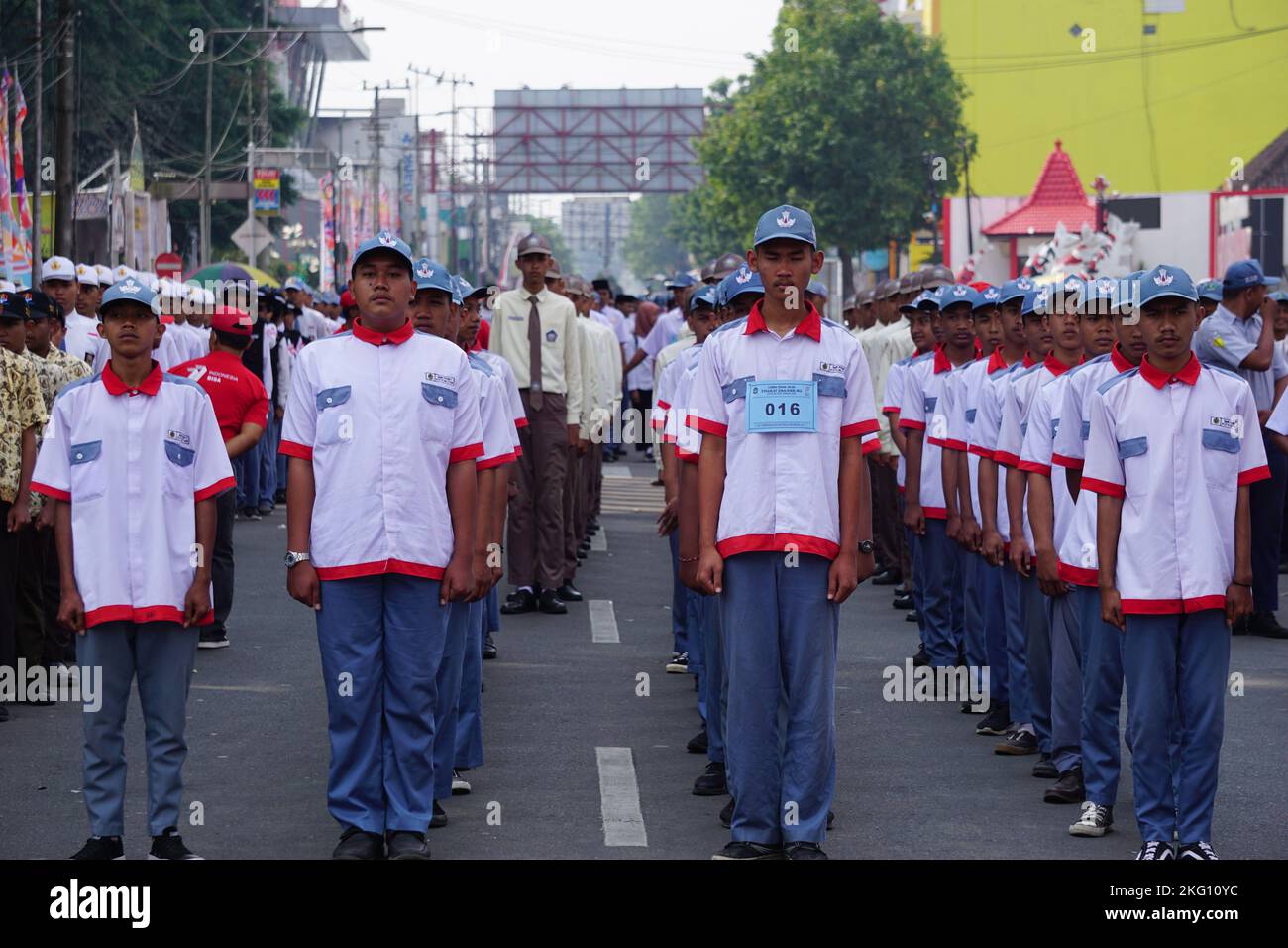 Indonesian senior high school students with uniforms, marching to ...