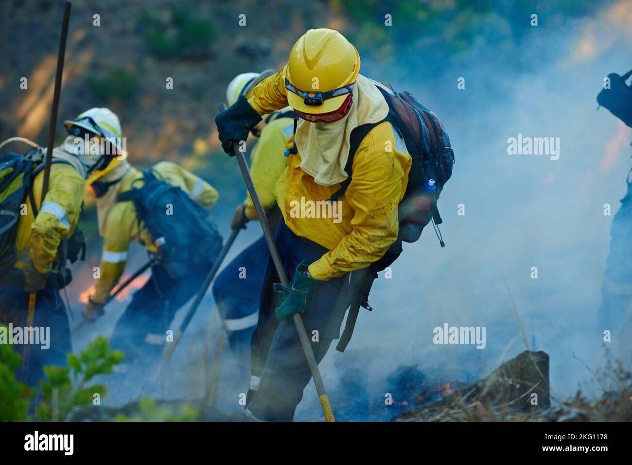 Lets get this fire under control. fire fighters combating a wild fire ...