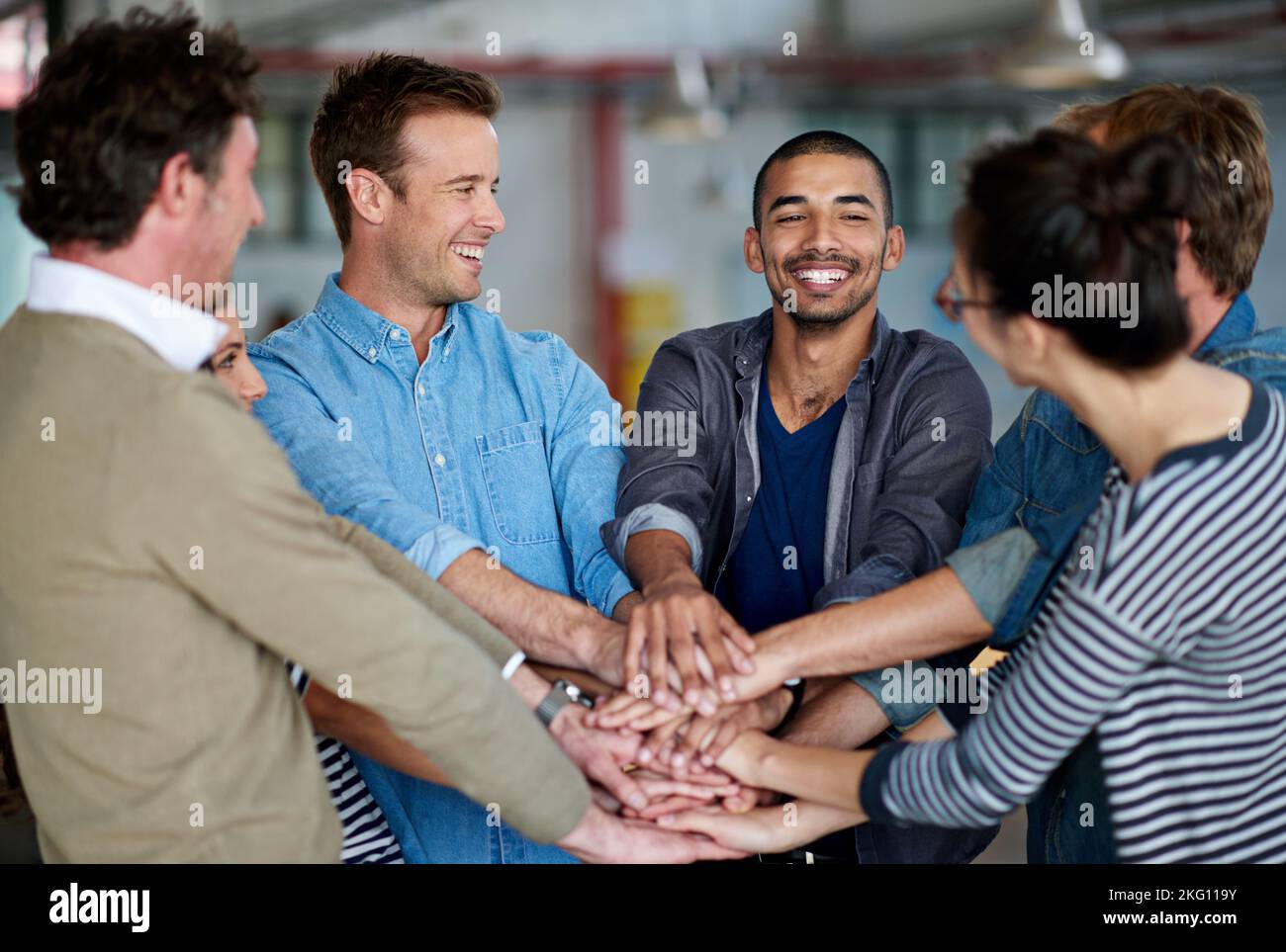 Hes the man of the moment. Positive young ethnic man with his ...