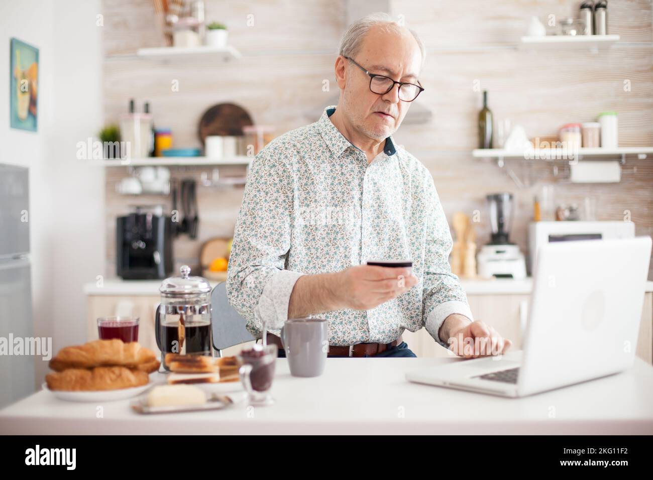 Old person online banking hi-res stock photography and images - Alamy