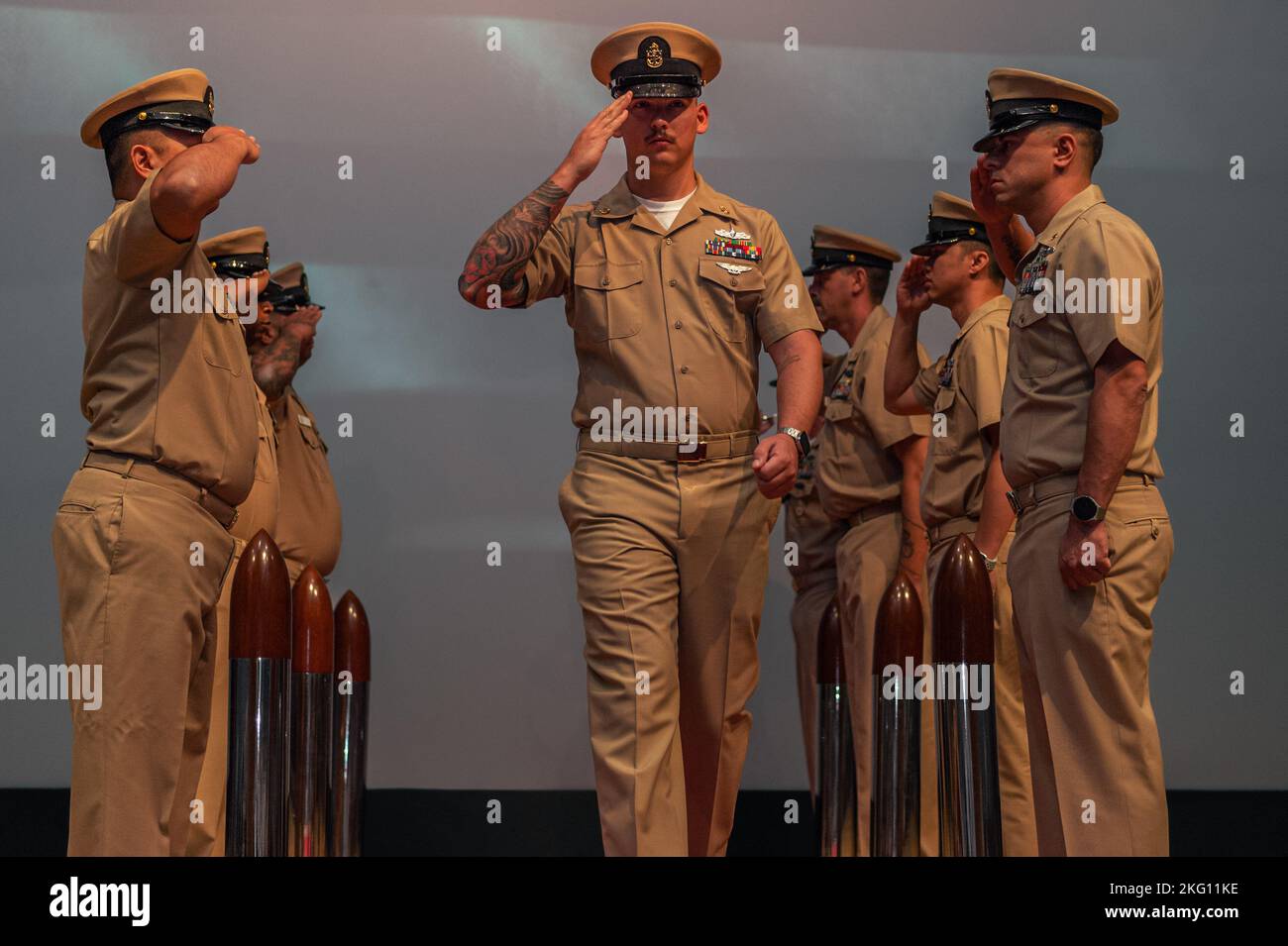 YOKOSUKA, Japan, (Oct. 21, 2022) Chief Gunner’s Mate Jonathan Ward renders a salute while ...
