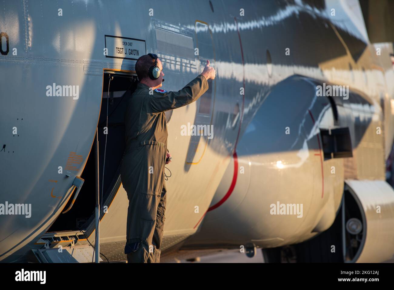 Maj. Peyton Eustis, 53rd Weather Reconnaissance Squadron pilot, gives a ...
