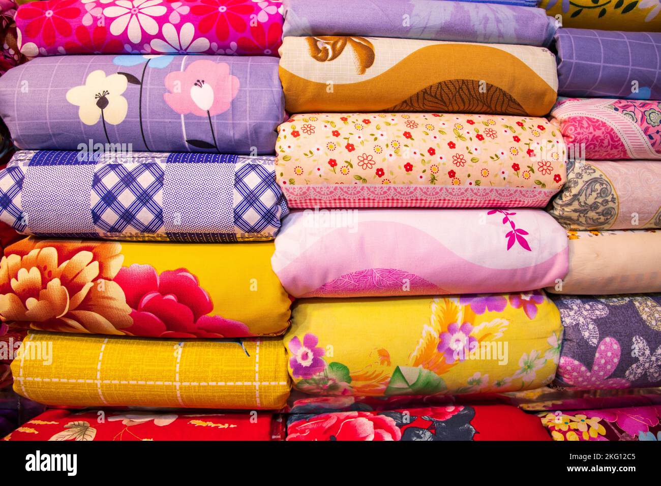 Artistic variety shade tone colors Bed sheets stacked on retail Shop ...