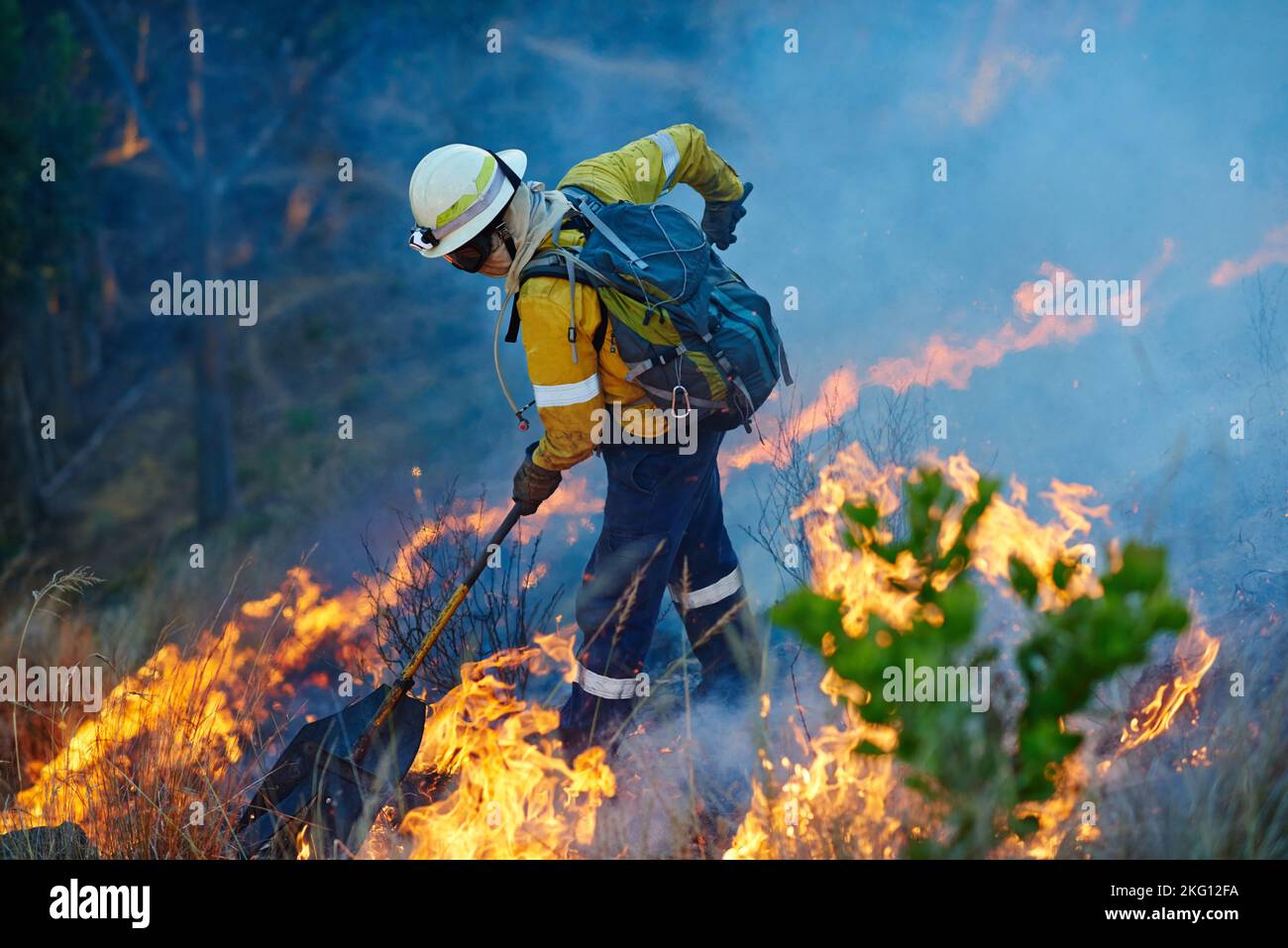 This needs to get under control. fire fighters combating a wild fire ...
