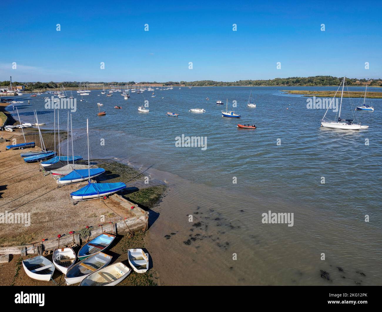 A landscape of boats on Deben River in Waldringfield in Suffolk ...